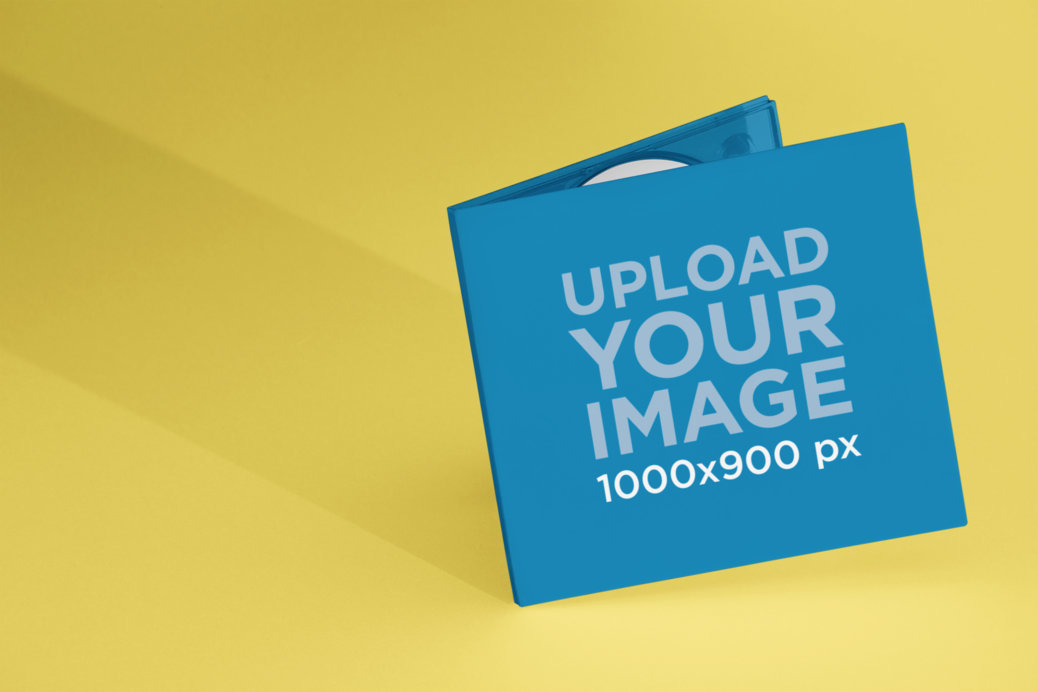 Placeit - Mockup of a Tilted Digipak Against a Plain Background