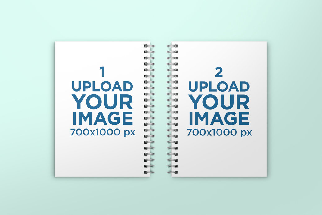 Placeit - Mockup of Two A5 Spiral Notebooks Lying Side by Side