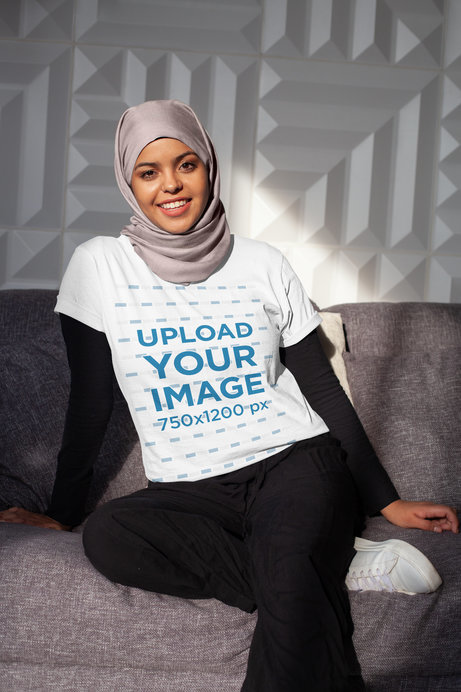 Placeit - Shirt Mockup of a Smiling Woman With a Hijab Sitting in the ...