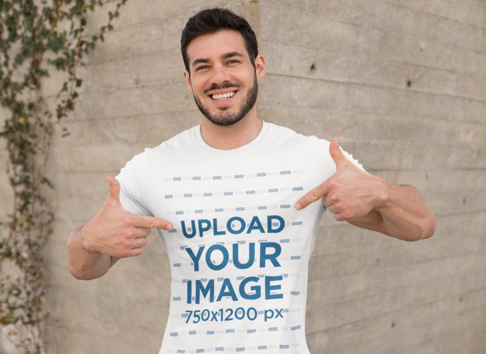 Placeit - Mockup of a Muscular Man Pointing at His T-Shirt