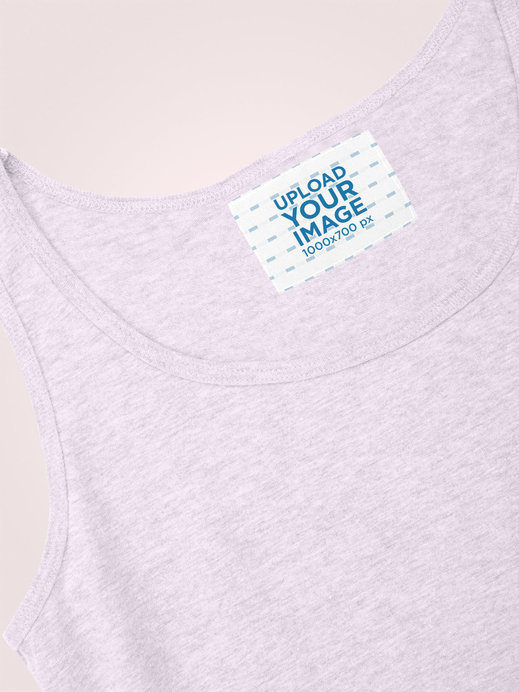 Placeit - Clothing Label Mockup of a Tank Top Against a Plain Backdrop