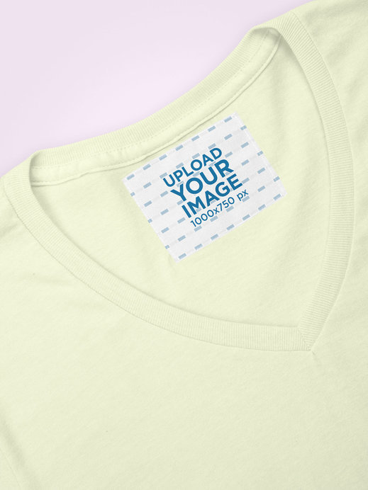 Placeit - Inside Clothing Label Mockup on a V-Neck Tee