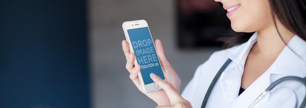 Placeit - iPhone Mockup Featuring a Female Doctor at a Hospital