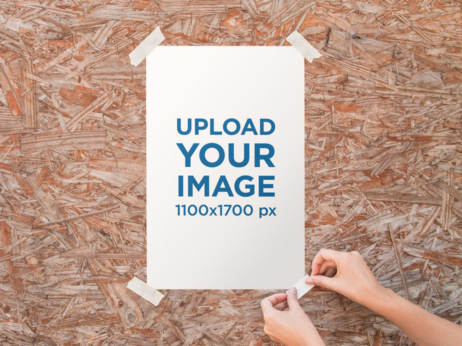 Placeit - Poster Mockup Pasted to a Wooden Wall