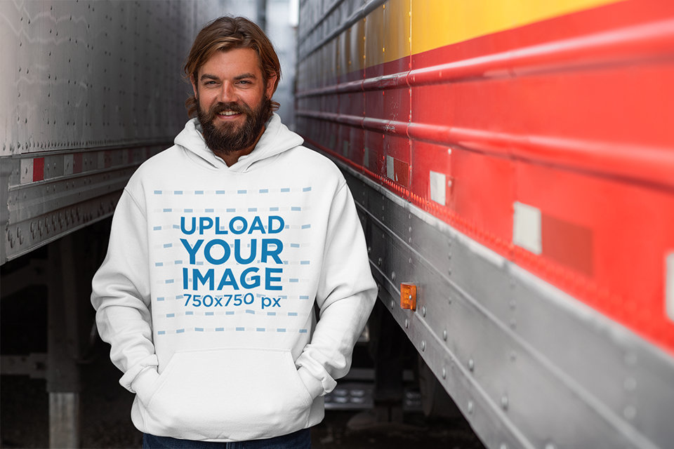 Placeit - Hoodie Pullover Mockup Featuring a Smiling Truck Driver
