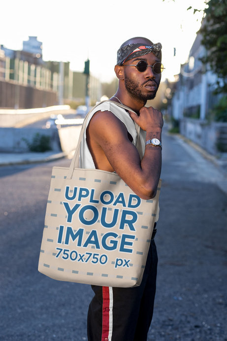 Placeit - Mockup of a Trendy Man Carrying a Tote Bag with a ...