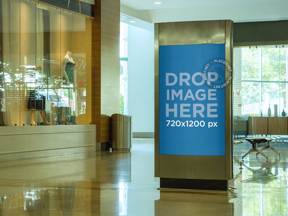 Placeit - Billboard Mockup Outside a Clothing Store at a Mall