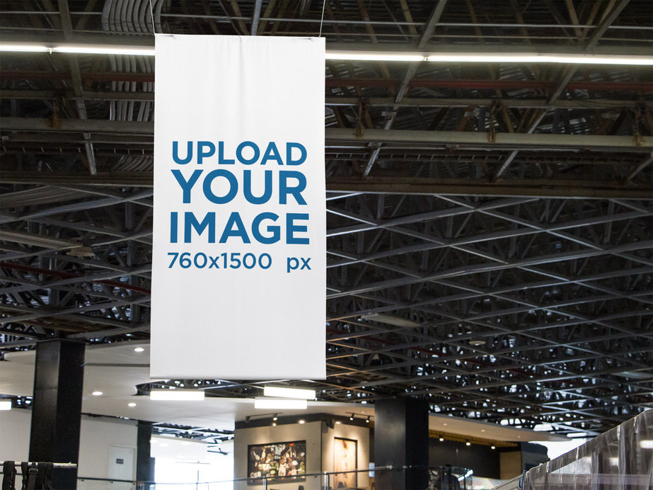 Placeit - Vertical Banner Mockup Hanging From the Ceiling at an Airport
