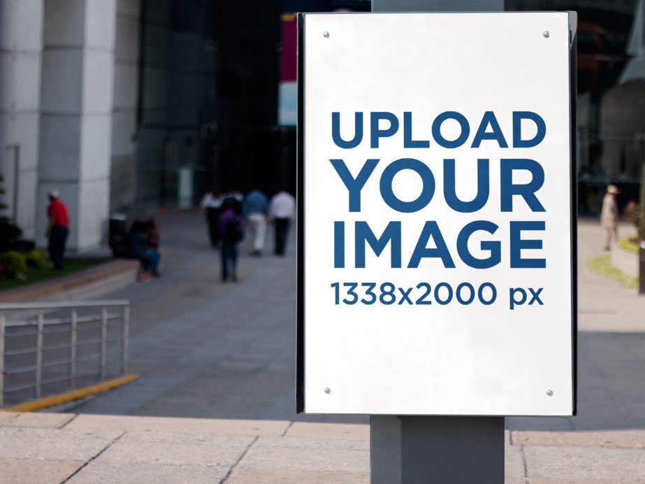 Placeit - Poster Mockup Nailed to a Lamp Post in the Street