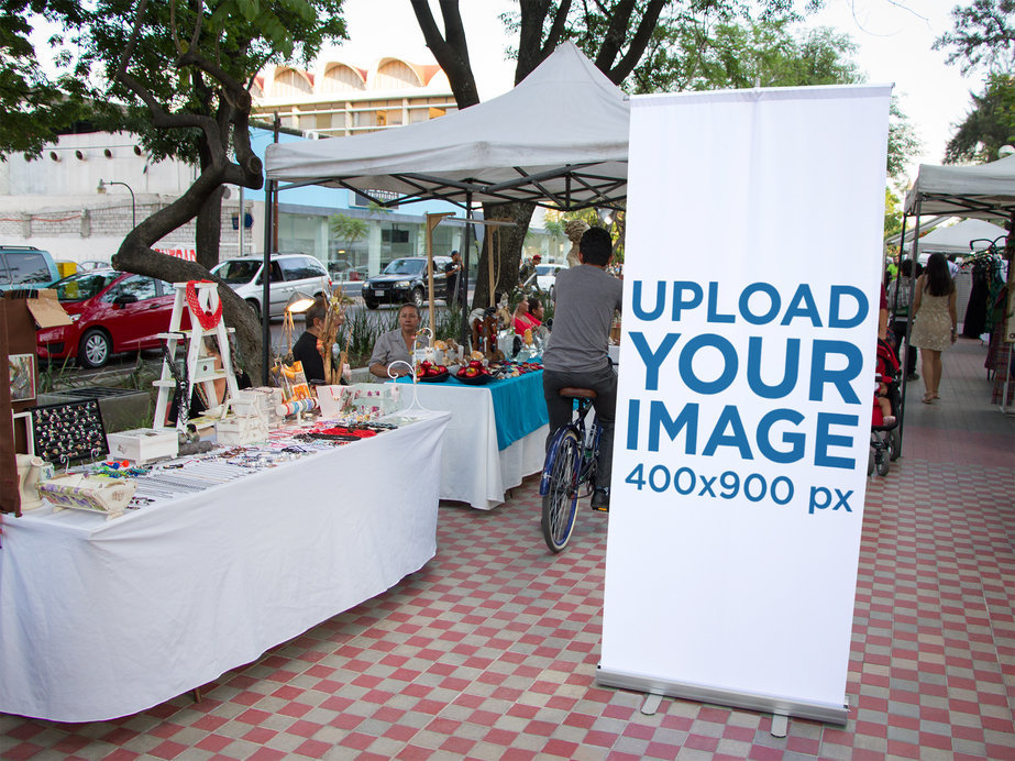 Placeit - Vertical Banner Mockup in a Street Flea Market