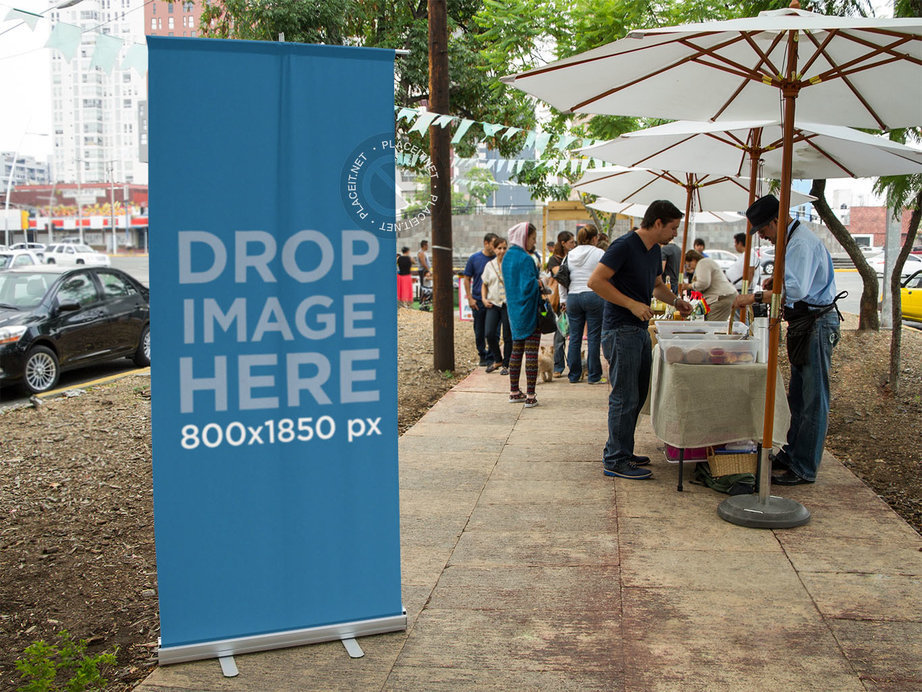 Placeit - Vertical Banner Mockup at a Street Market