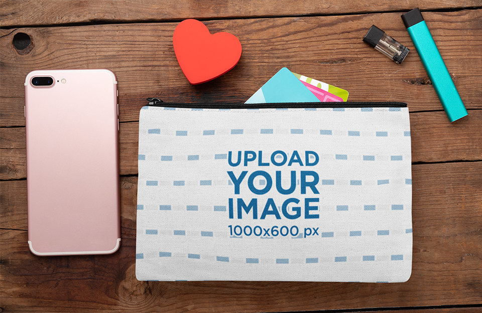 Placeit - Mockup of a Pouch Surrounded by Accessories and a Vape Pen