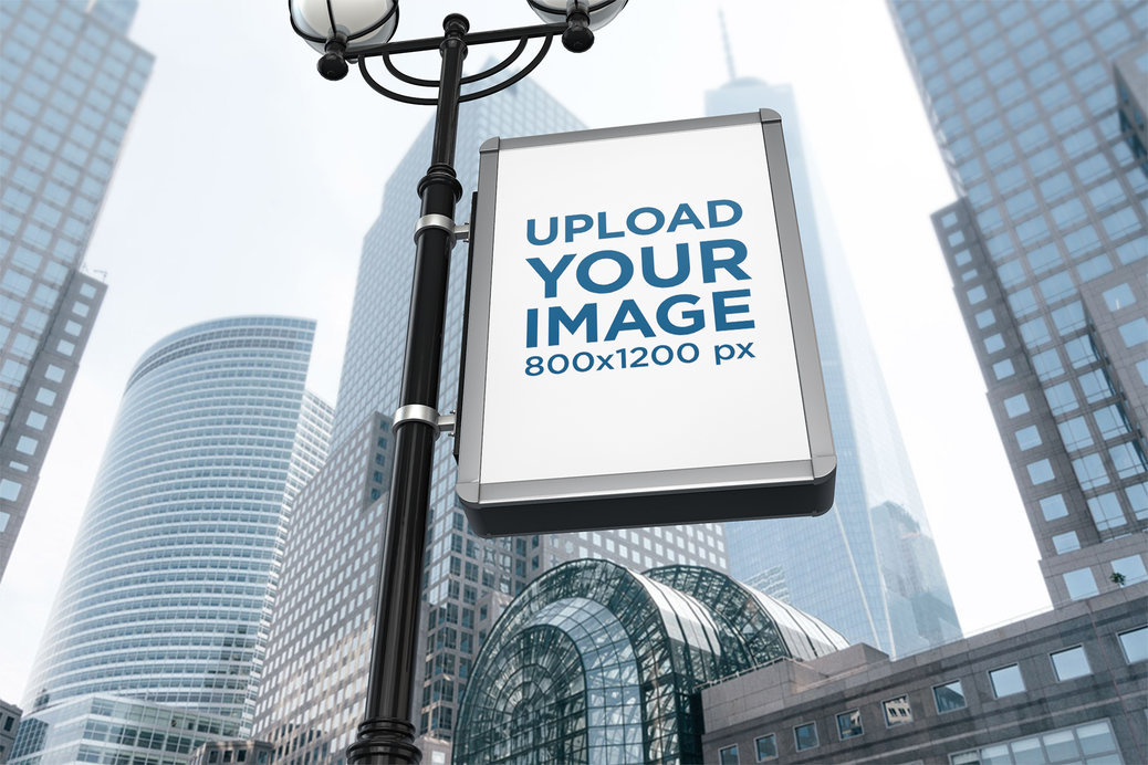 Placeit - Advertising MUPI Mockup Placed on a Lamp Post Against City ...