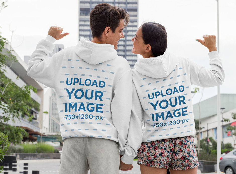 Placeit - Mockup of a Romantic Couple Wearing Pullover Hoodies