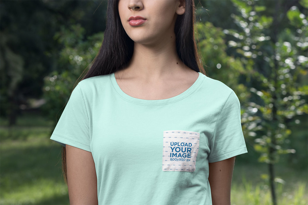 Placeit - Mockup Featuring a Woman Wearing a Frontal Pocket Tee