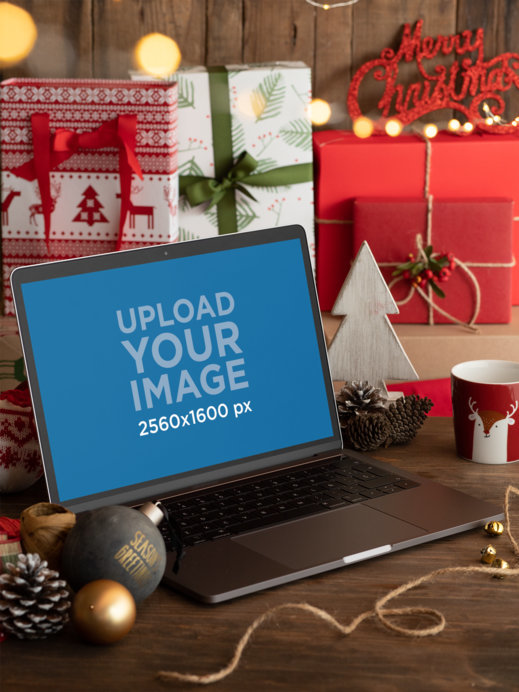 Placeit - Mockup of a MacBook Pro Placed on a Christmas-Decorated Setting