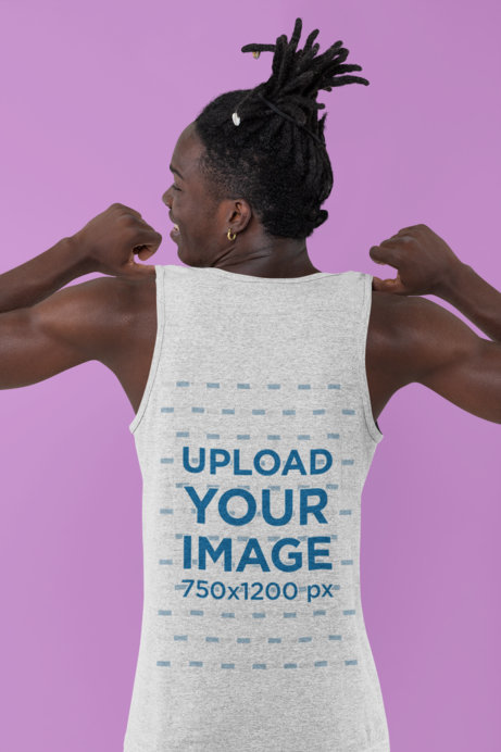Placeit - Mockup of a Man Pointing at His Heathered Tank Top at a Studio