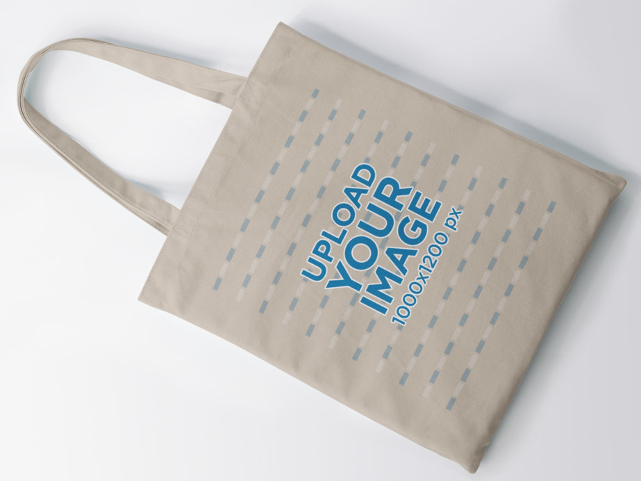 Placeit - Top View of Tote Bag Mockup Over a White Background