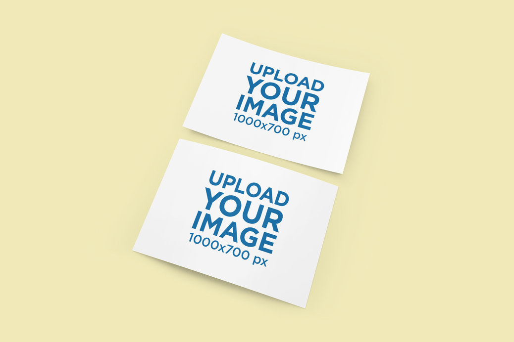 Placeit - Mockup of Two Postcards Lying on a Solid Color Background