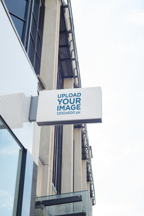 Placeit - Rectangular Store Sign Mockup Placed on a Building