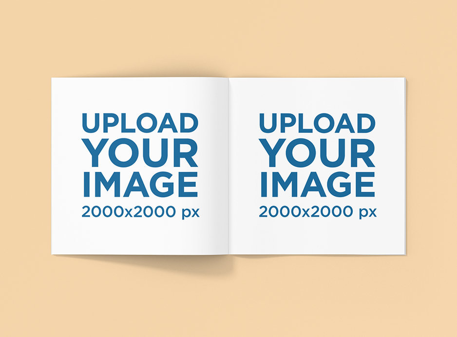 Placeit - Mockup Featuring an Open Square Booklet over a Solid Color ...