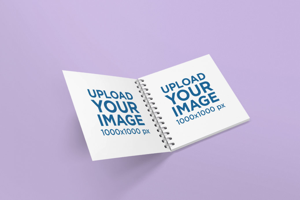 Placeit - Mockup of an Open Square Notebook Placed over a Plain Color ...