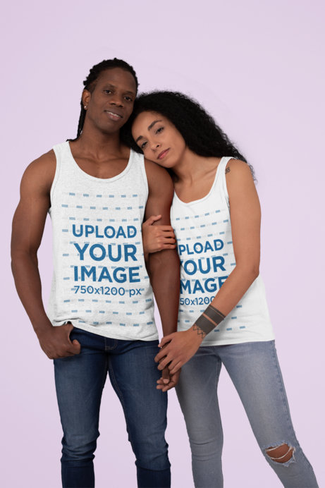 Placeit - Mockup of a Couple Wearing Tank Tops at a Studio