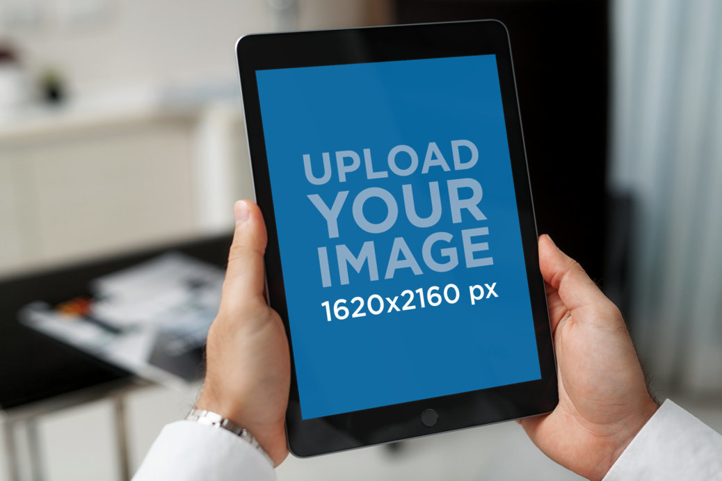 Placeit - Mockup of a Man's Hands Holding an iPad