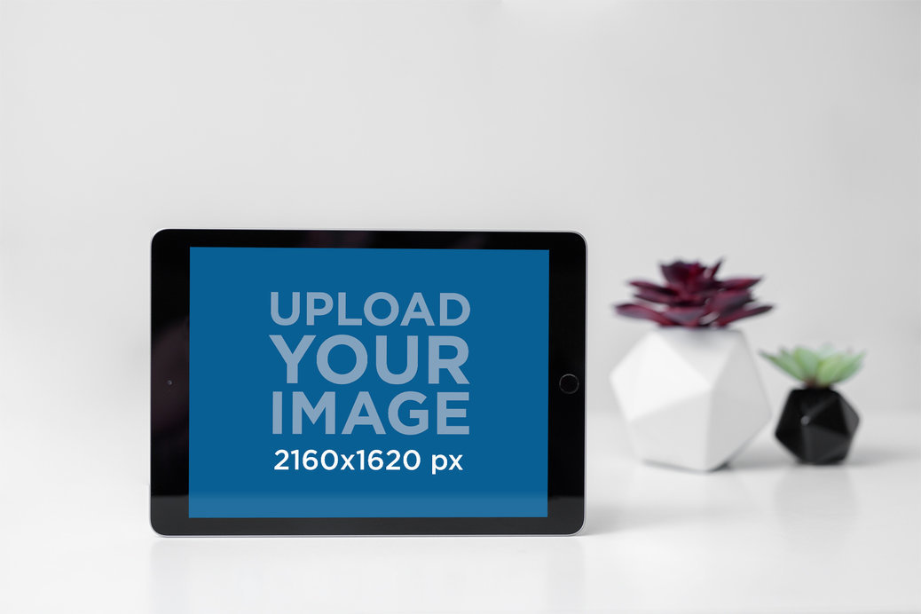 Placeit - Mockup Featuring an iPad in Landscape Position Placed by Two ...