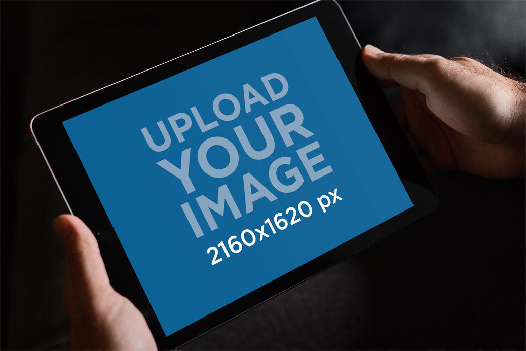 Placeit - Mockup Featuring a Man's Hands Holding an iPad in Landscape ...