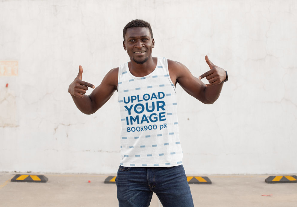 Placeit - Mockup of a Man Pointing at His Sublimated Tank Top at a ...