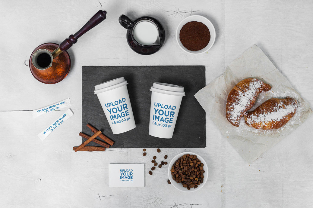 Placeit - Coffee Cup Mockup Featuring Sugar Packets and a Business Card
