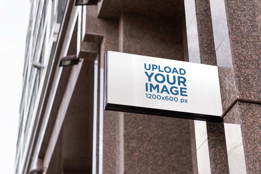 Placeit - Mockup of a Shop Sign Attached to an Elegant Building Wall