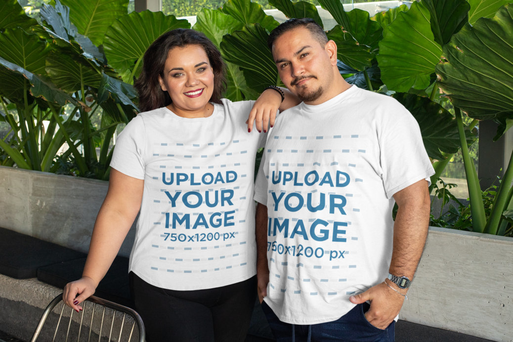 Placeit - Mockup of Two Friends Wearing Plus Size T-Shirts at a Restaurant