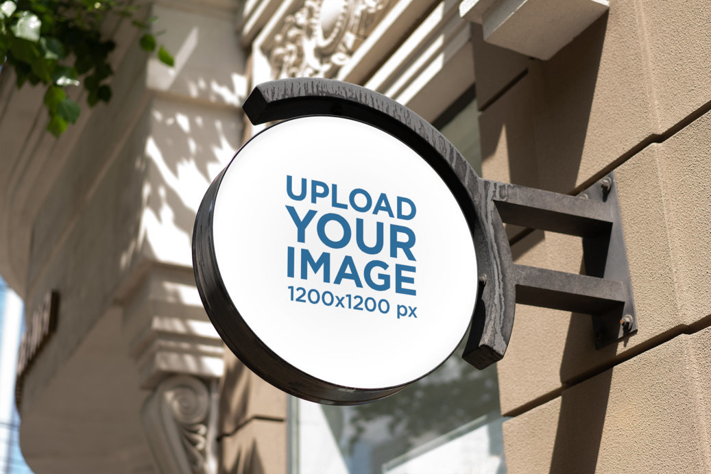 Placeit - Circular Sign Mockup Placed Outside a Store