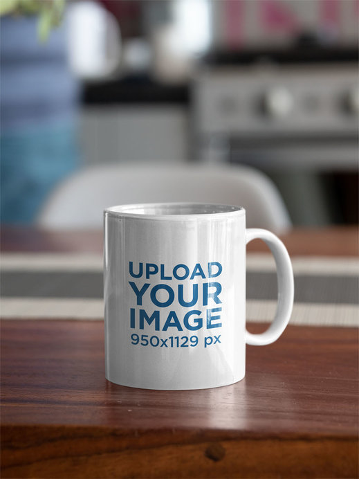 Placeit - Mockup of an 11 oz Coffee Mug Placed on a Tabletop