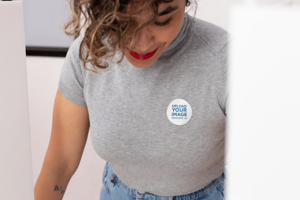 Placeit - Mockup of a Woman with a Sticker on Her Blouse