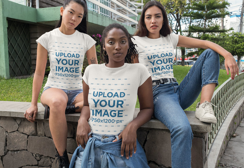 Placeit - Mockup of Three Women Wearing T-Shirts Outside