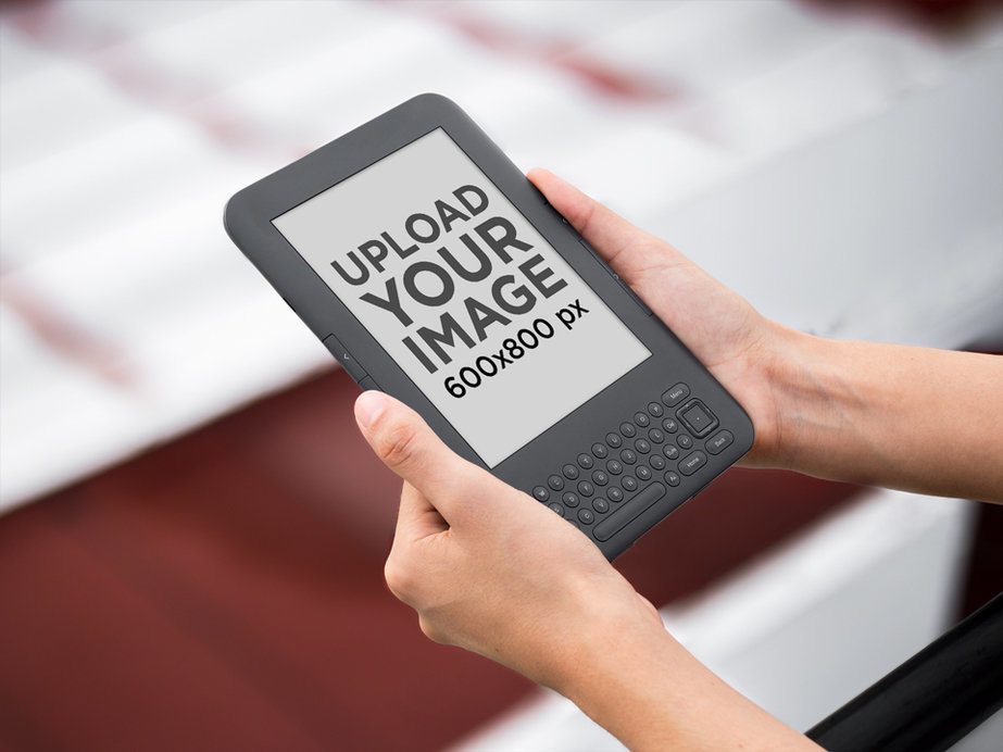 Placeit - Amazon Kindle Mockup Held With Both Hands Mockup