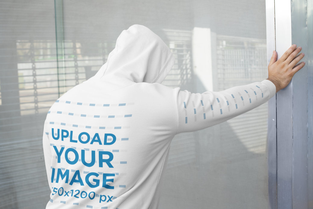 Placeit - Back View Mockup of a Man Wearing a Hoodie with a ...