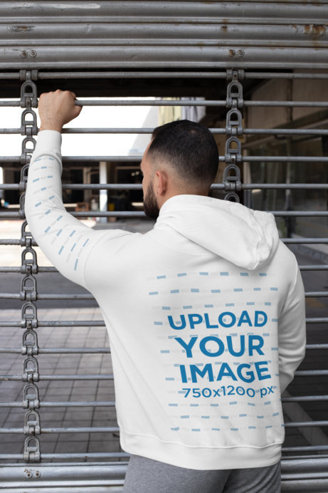 Placeit - Back-View Mockup of a Man Wearing a Hoodie with a ...