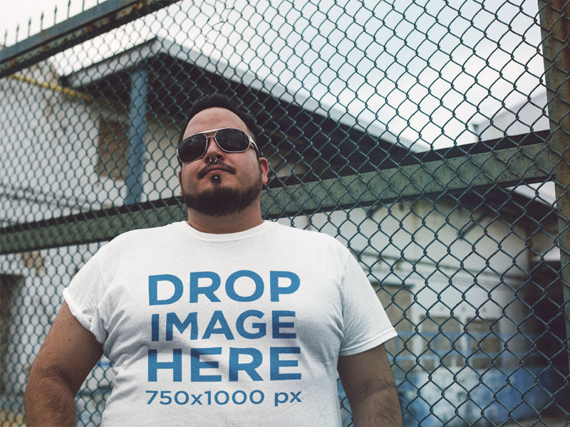 Placeit - Plus Size Tee Mockup of a Young Man with a Piercing