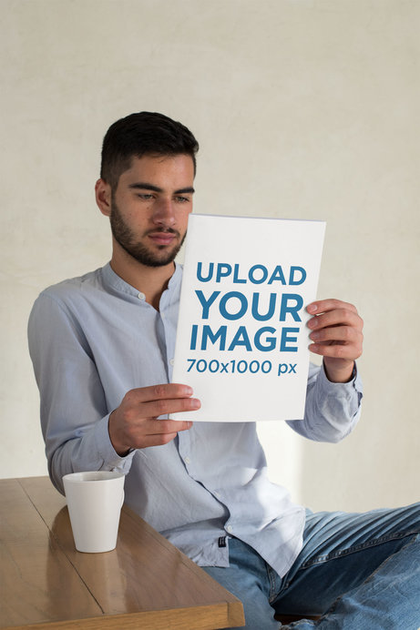 Placeit - Magazine Mockup Featuring a Man Reading a Cover
