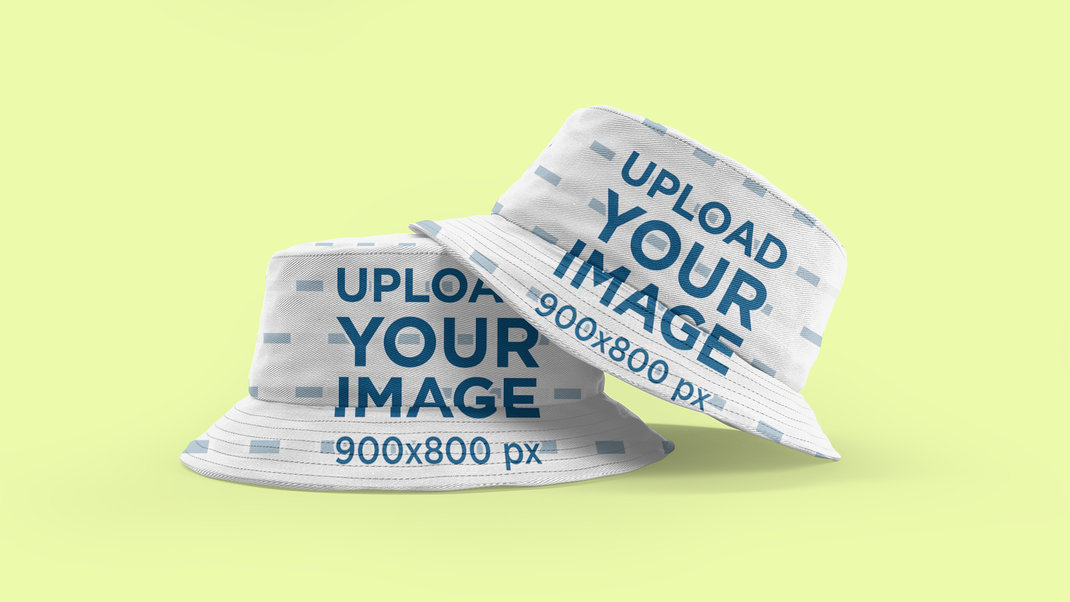 Placeit - Mockup of Two Bucket Hats Against a Customizable Background