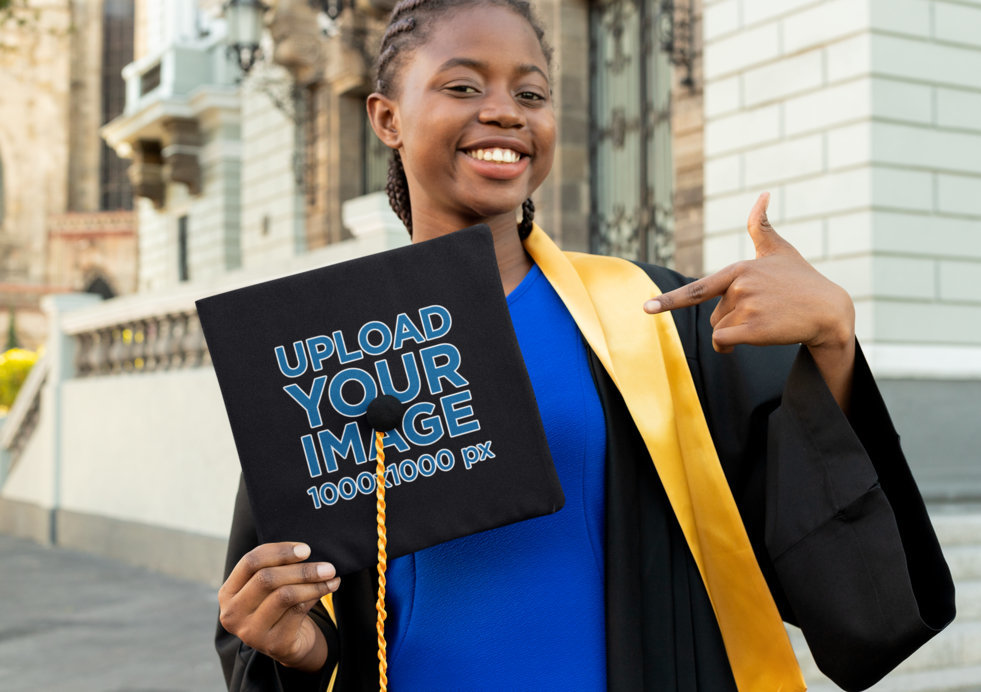 Placeit - Mockup of a Young Woman Pointing at Her Graduation Cap
