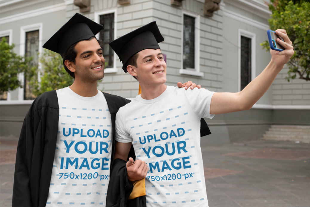 Placeit - T-Shirt Mockup of Two Friends Taking a Selfie on Graduation Day