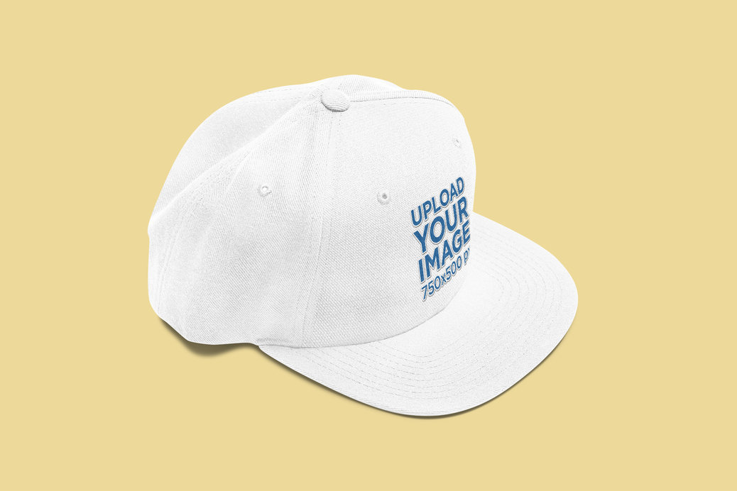 Placeit - Mockup of a Fitted Hat Placed on a Solid Color Surface