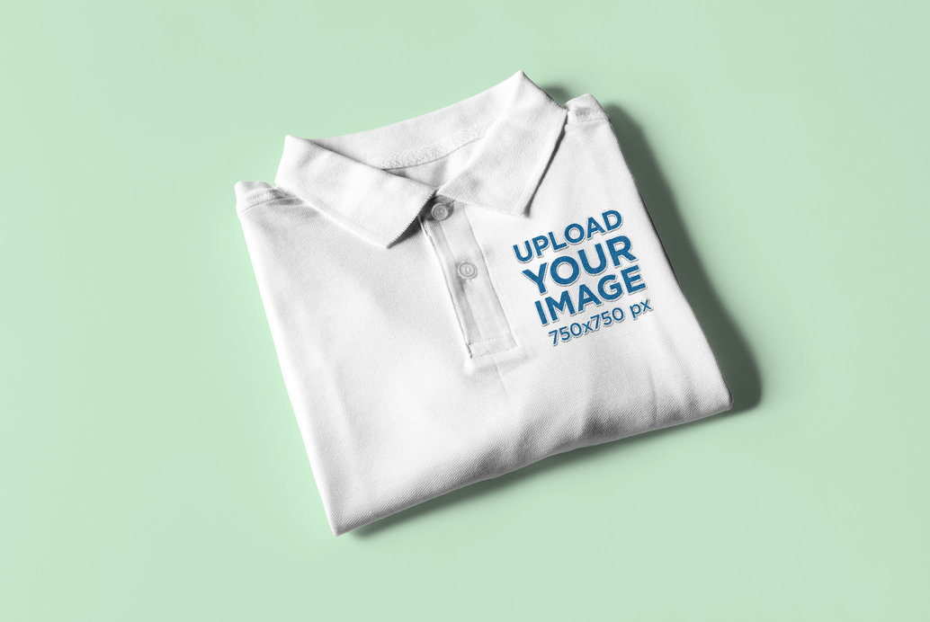 Placeit - Mockup of a Folded Polo Shirt Placed on a Solid Surface