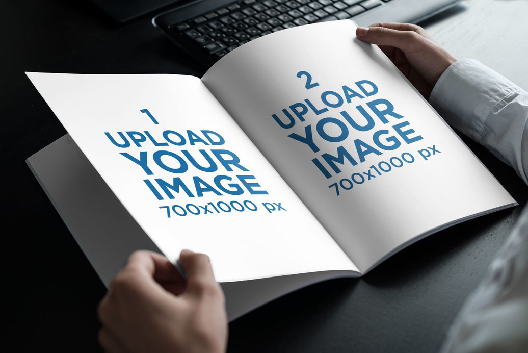 Placeit - Mockup of a Man Reading a Magazine on a Desk