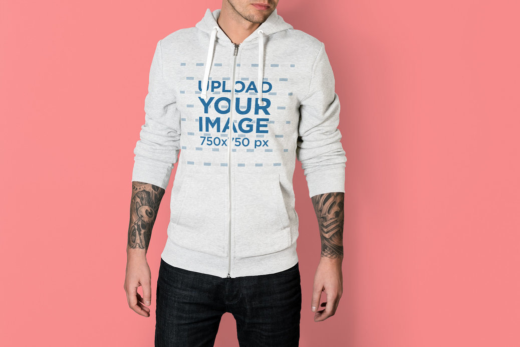 Placeit - Mockup of a Man Wearing a Heathered Full-Zip Hoodie in a Studio